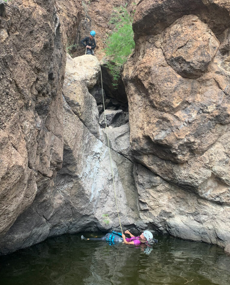 Rappel 140 feet into a lake at Splash Down Canyon - WildPathsAZ